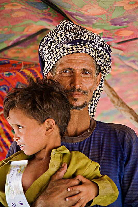 57 Rashaida man with child